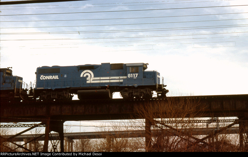 CR GP-38-2 #8117 leads an eastbound on "the woodwork" on the Delair bridge approach